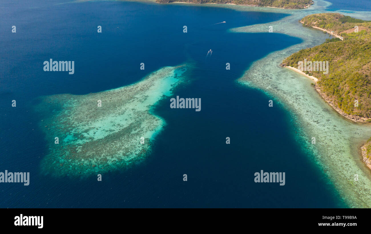 aerial seascape Lagoons with blue, azure water in middle of small ...
