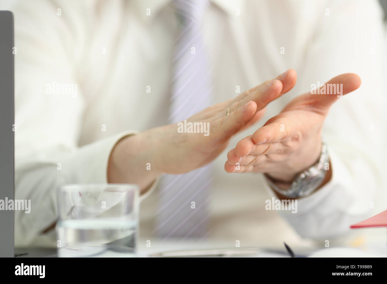 Man in suit clap his arms congrats Stock Photo - Alamy