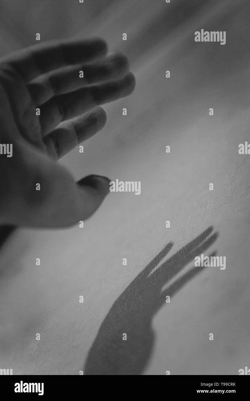 Human silhouette on wall Black and White Stock Photos & Images - Alamy