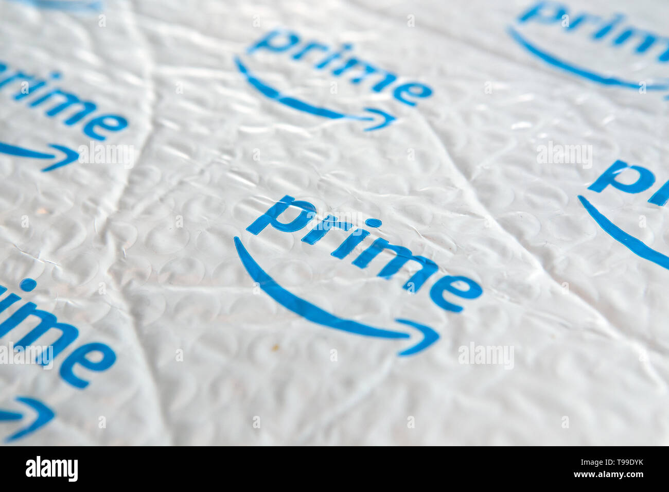 A white padded envelope showing a blue Amazon 'Prime' logo Stock Photo ...