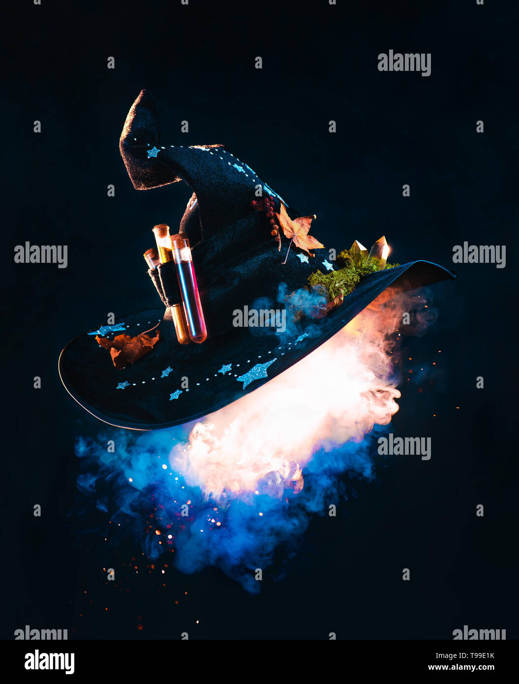 Pointed wizard or witch hat with potions and crystals lit from inside ...