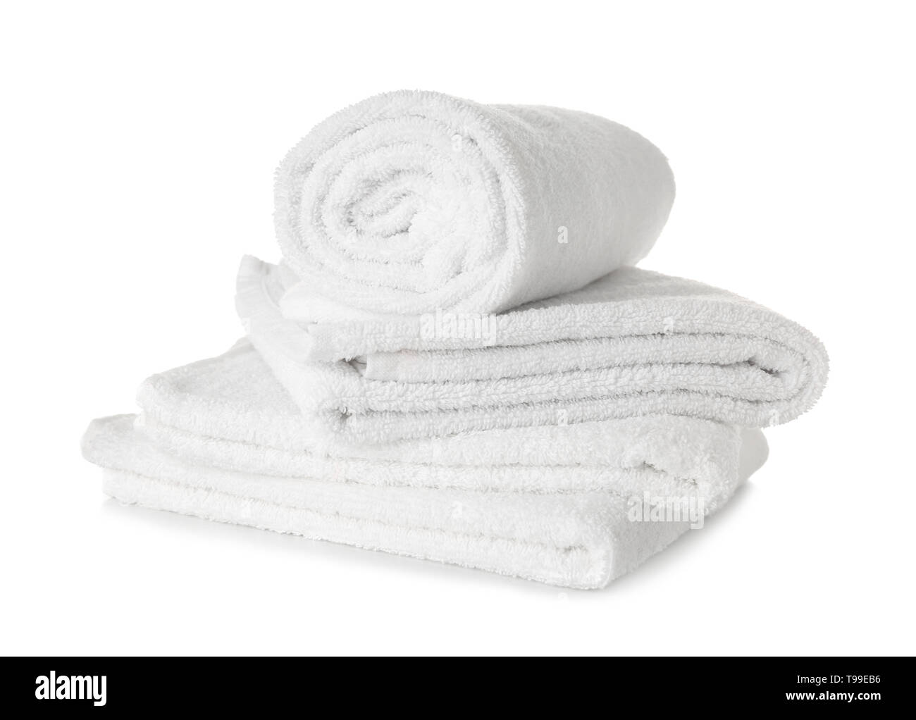 Stack of clean soft towels on white background Stock Photo - Alamy