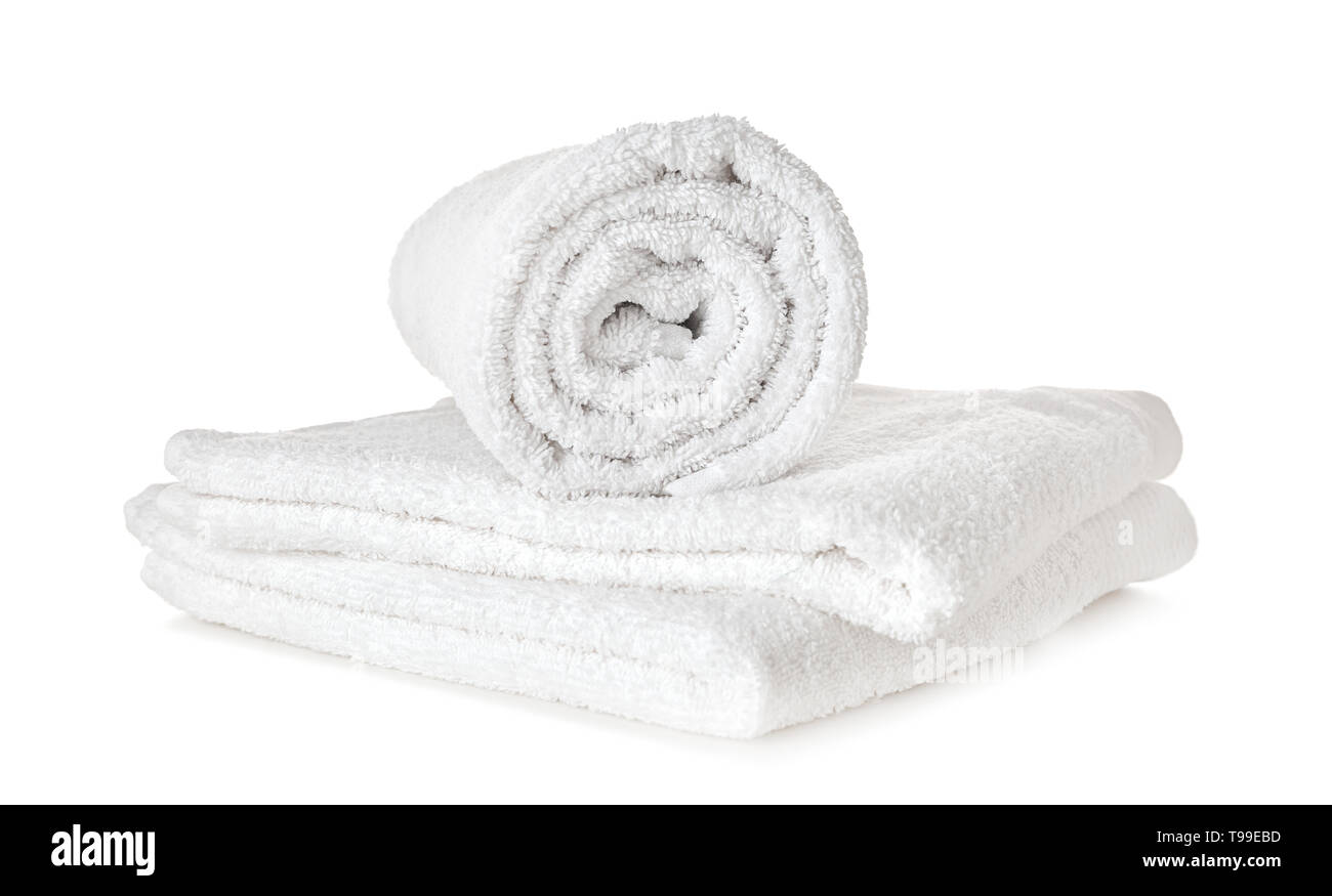 Stack of clean soft towels on white background Stock Photo - Alamy