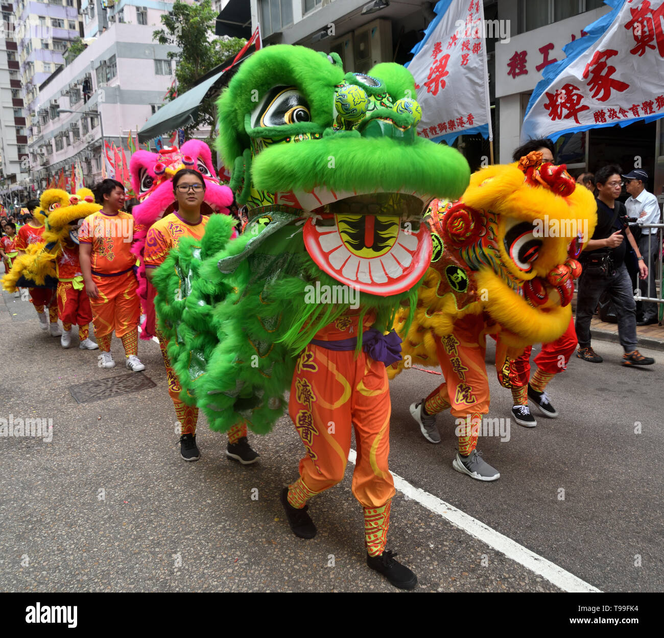 Lion dance on street parade, Hong Kong Stock Photo - Alamy