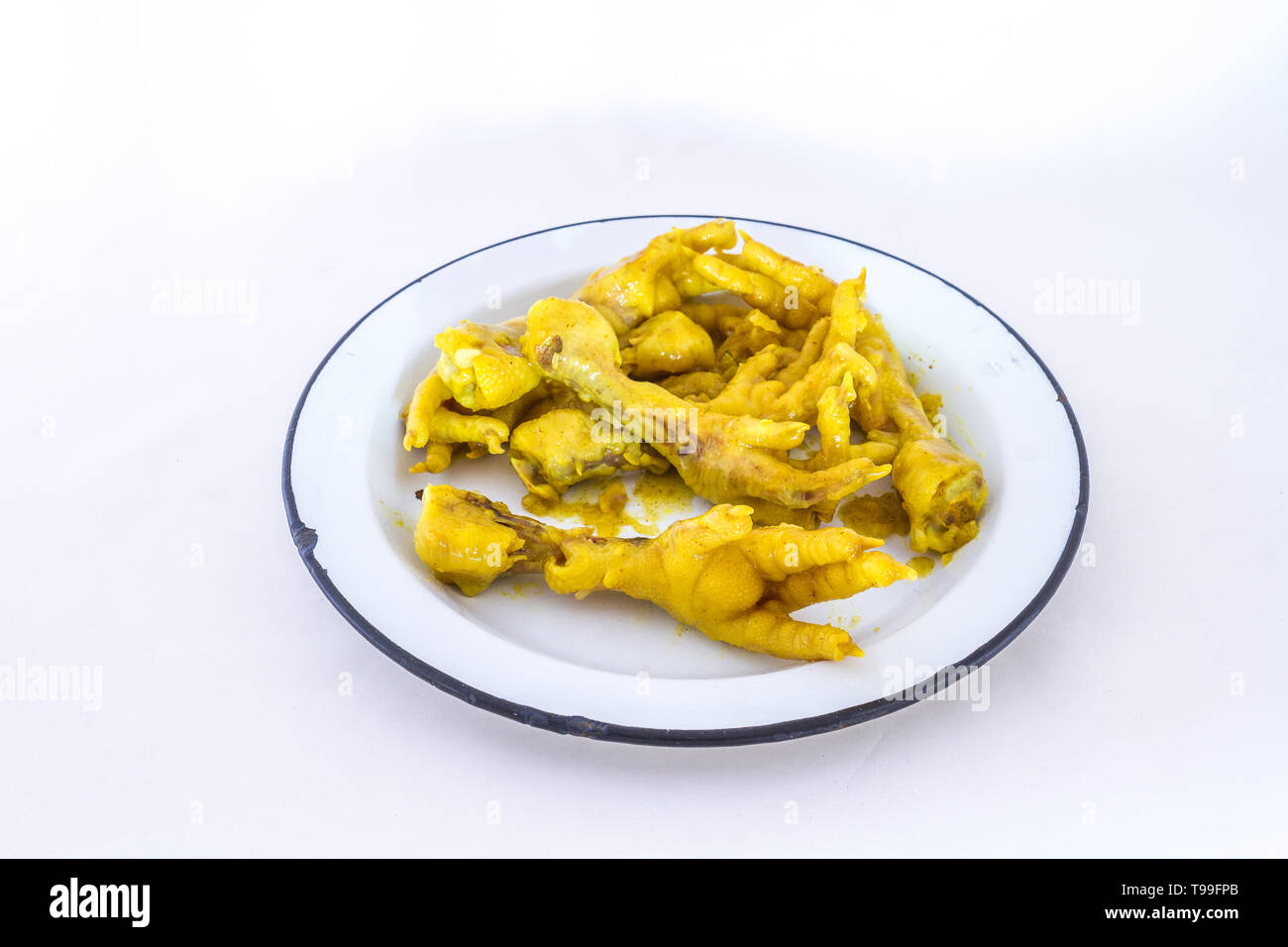 Deep fried chicken feet is a traditional South African township snack ...