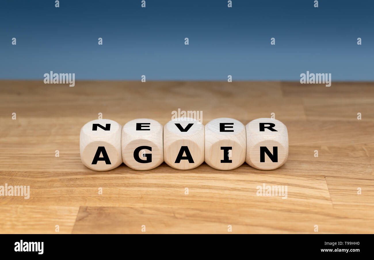Dice form the expression "never again Stock Photo - Alamy