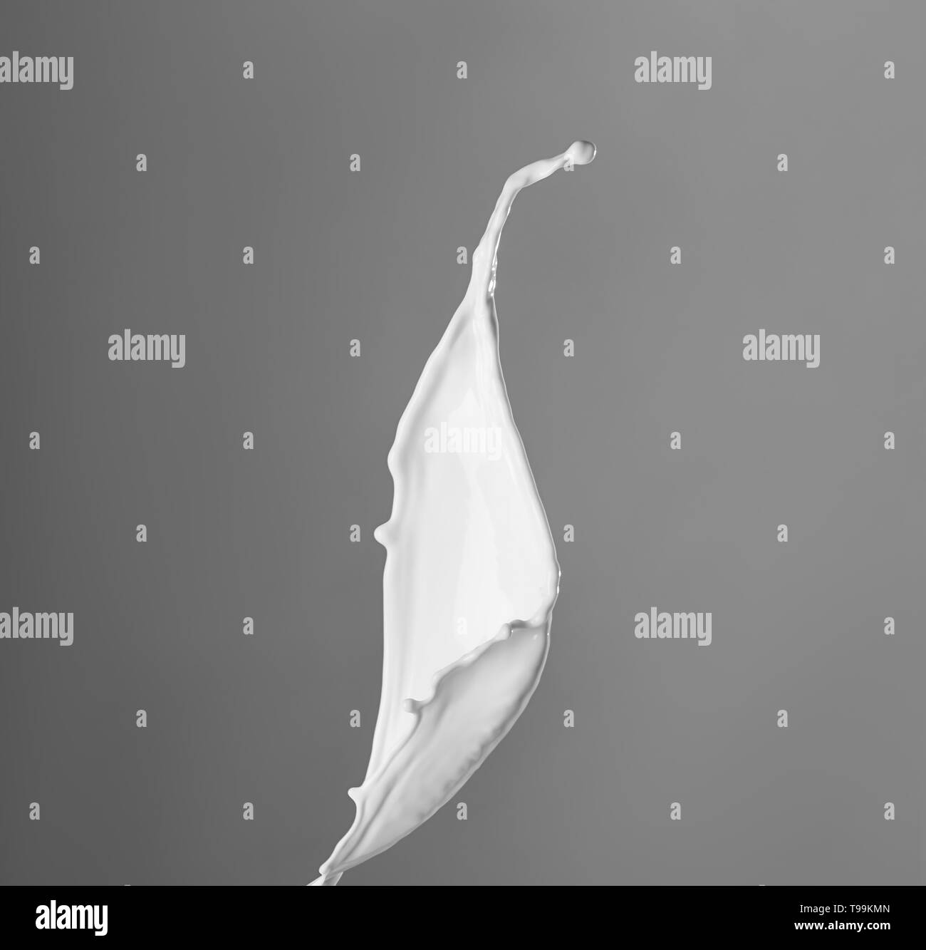 Splash of milk on grey background Stock Photo - Alamy