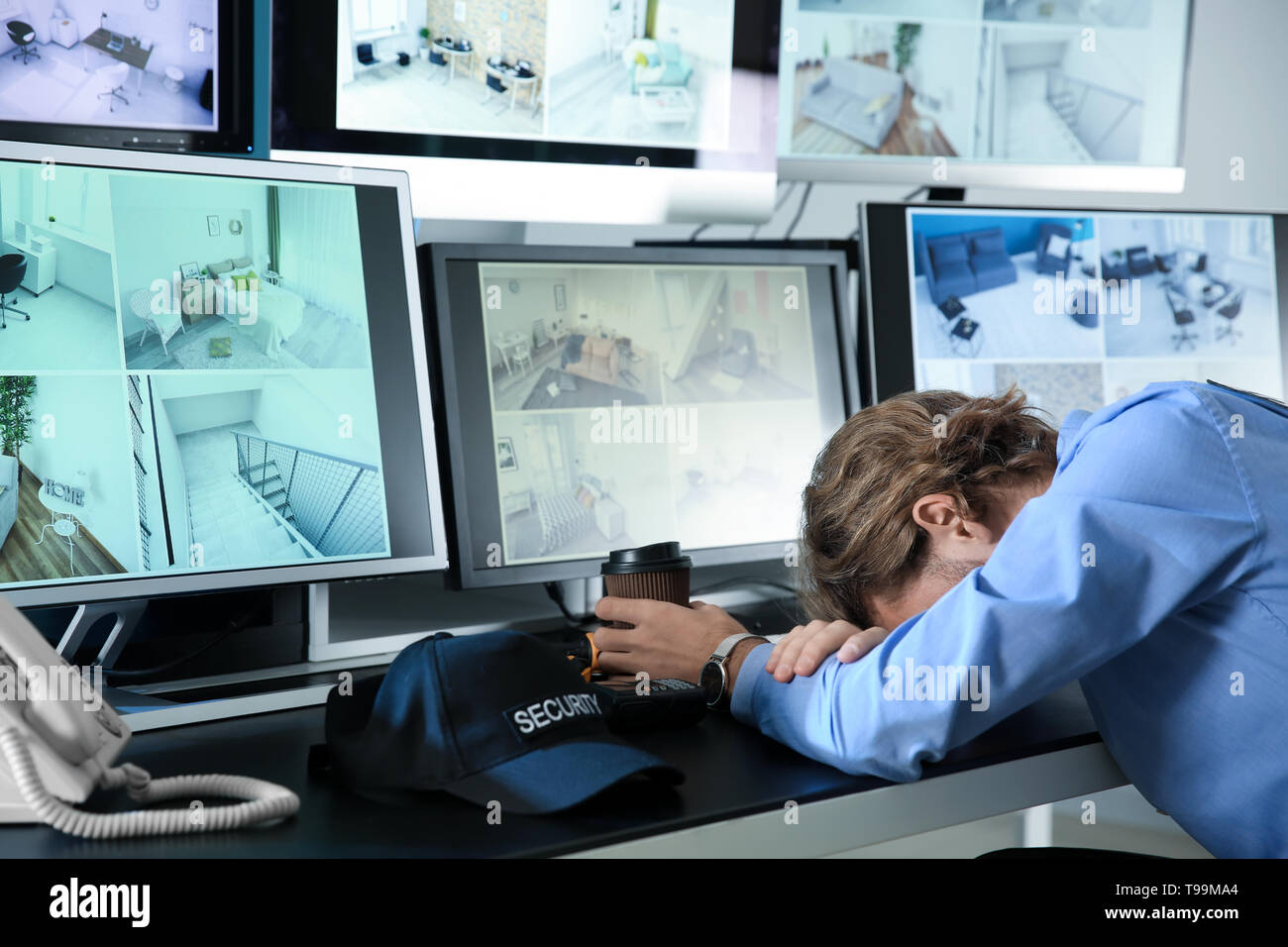 Bored security guard hi-res stock photography and images - Alamy