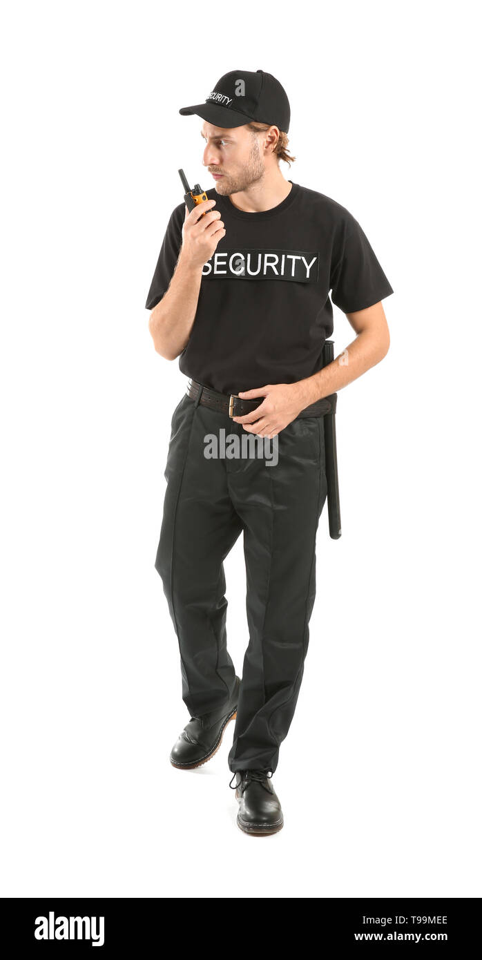 Male security guard with portable radio transmitter on white background ...