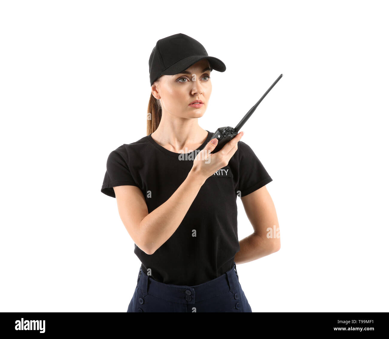 Female security guard with portable radio transmitter on white ...
