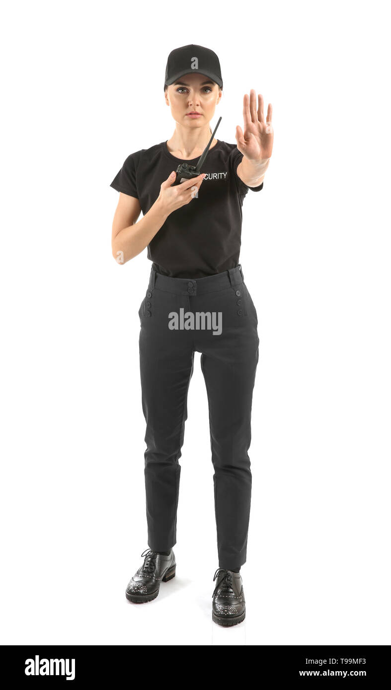 Female security guard showing Stop gesture on white background Stock ...