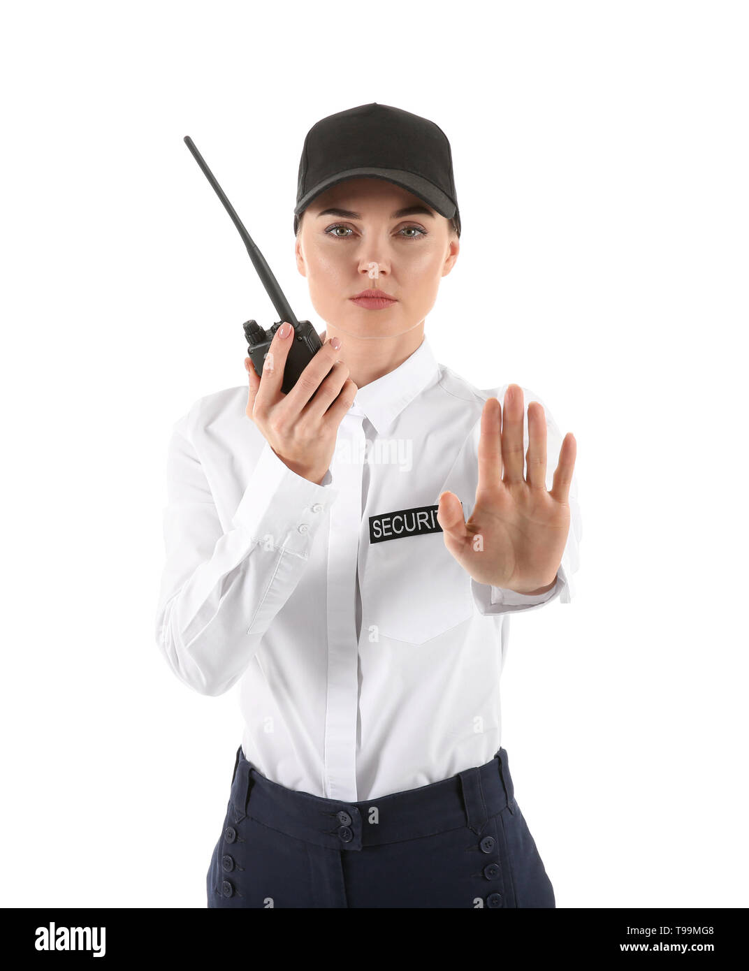 Female security guard with portable radio transmitter showing Stop ...