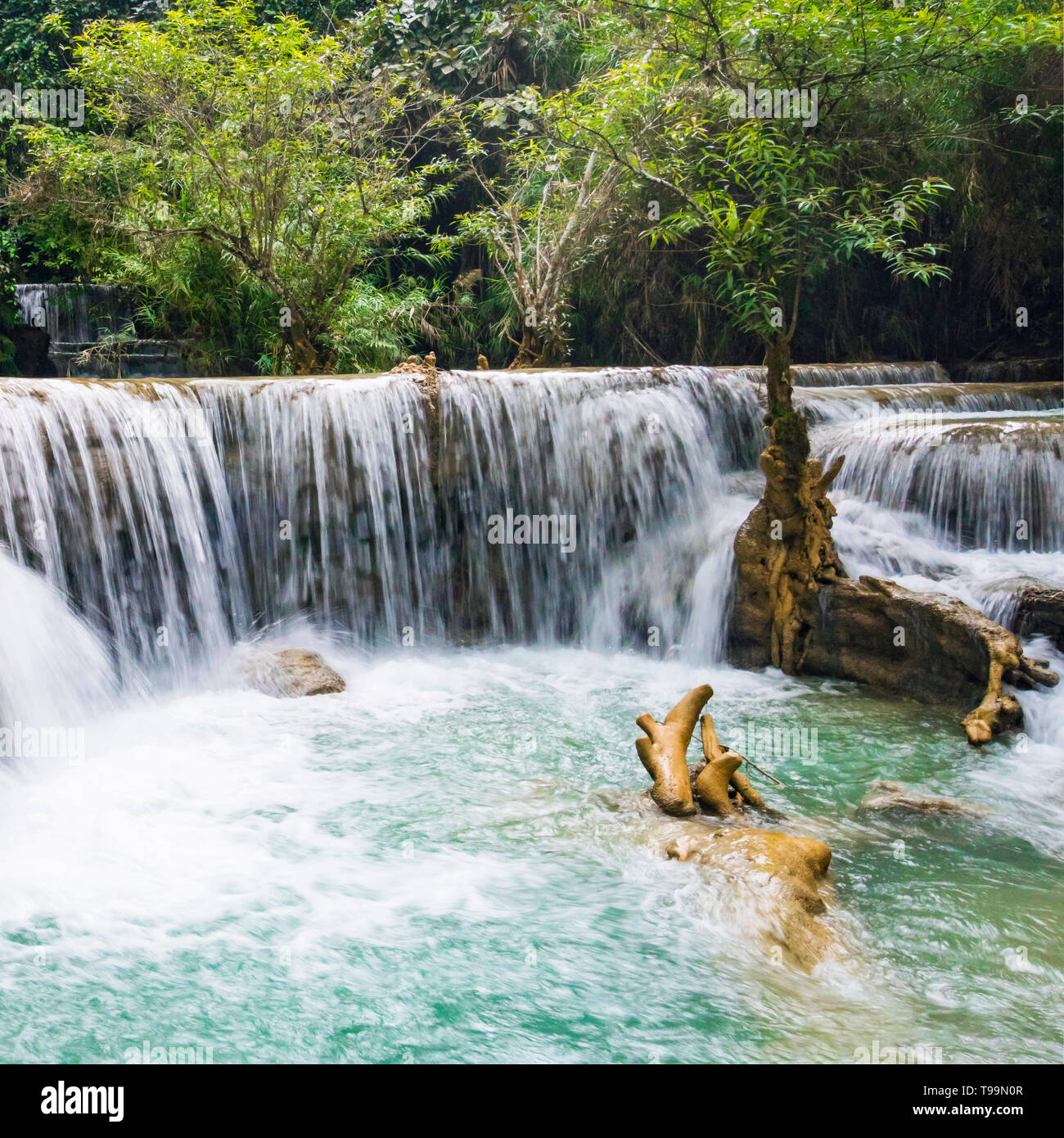 The Kuang Si Falls or known as Tat Kuang Si Waterfalls. These ...