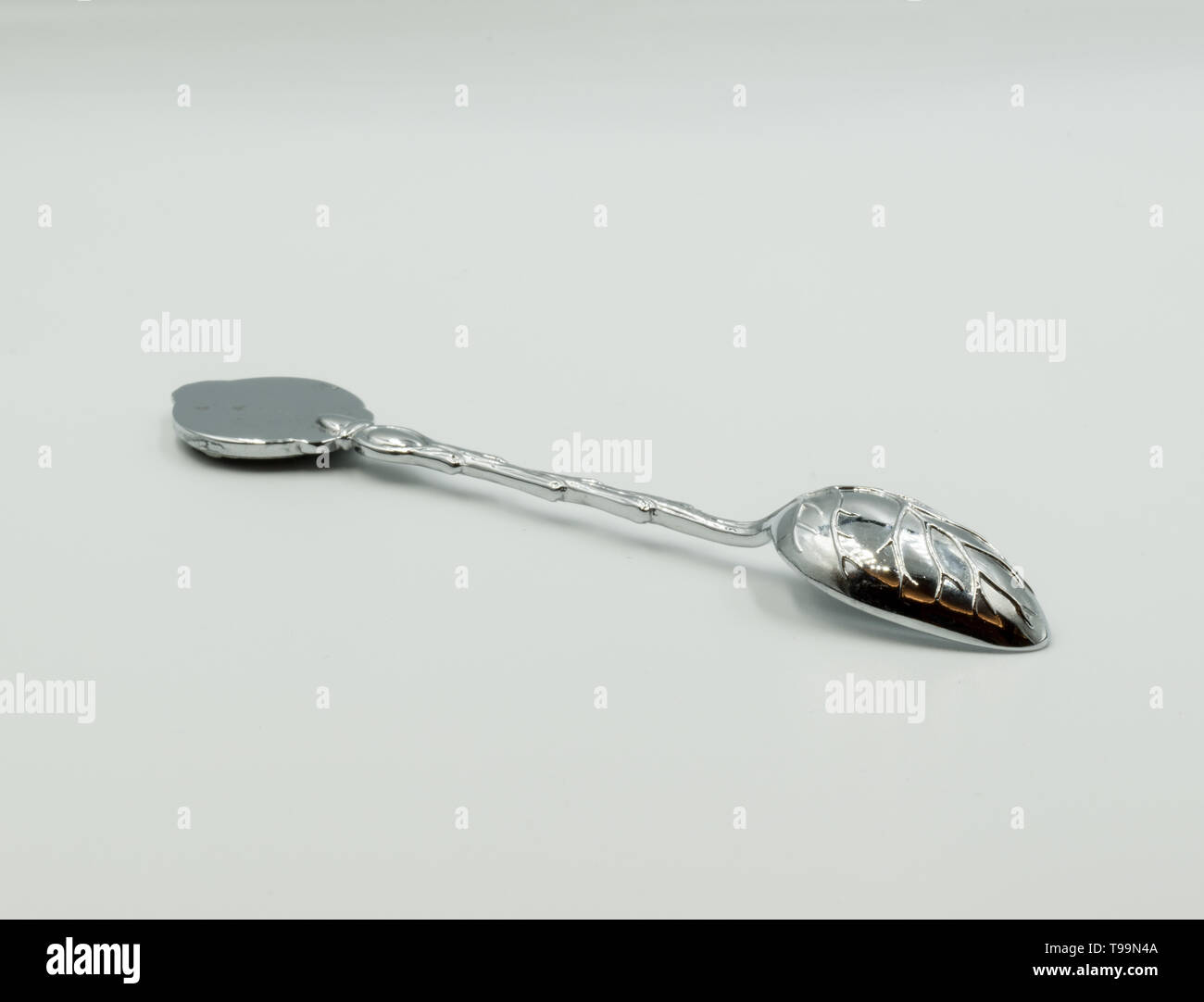 This is a capture of an old Aluminium spoon in a studio lighting and a ...
