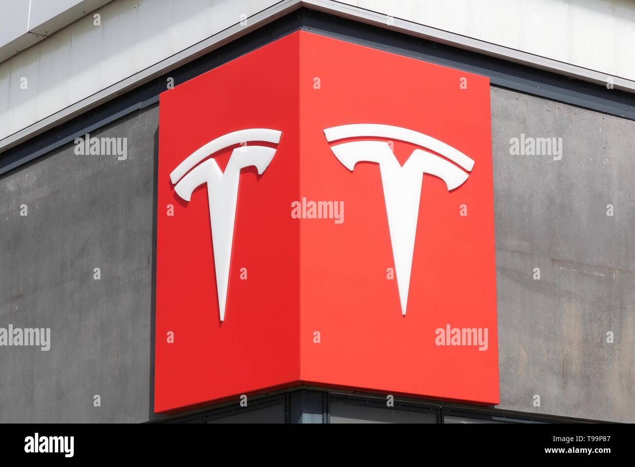 Aarhus, Denmark - May 10, 2018: Sign of Tesla cars on a building of a ...