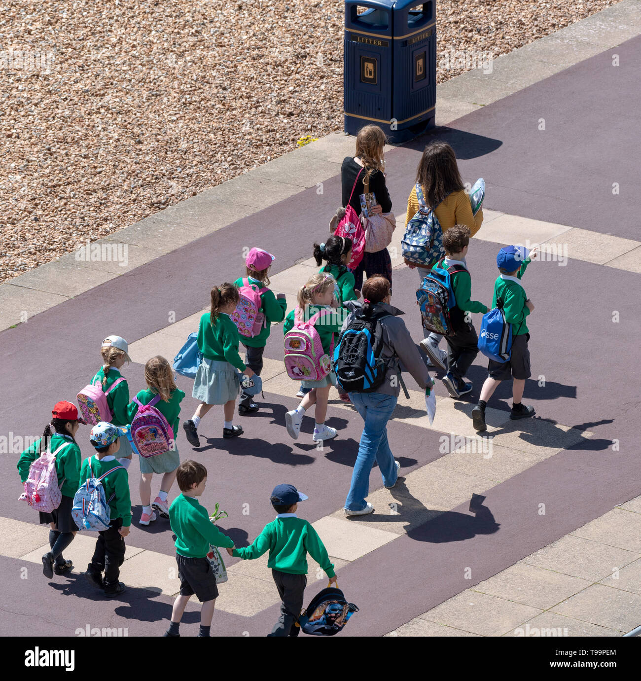 School boy walking out of school hi-res stock photography and images ...