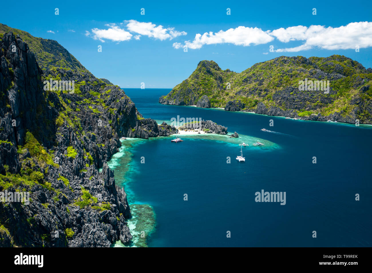 Aerial view of beautiful lagoons and limestone cliffs of El Nido ...