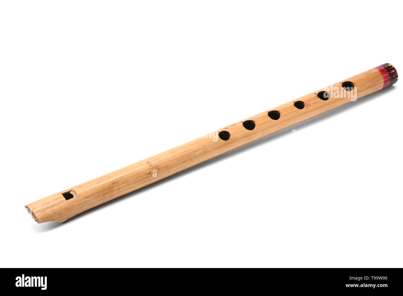 Wind musical instrument flute on an isolated white background.Pide ...