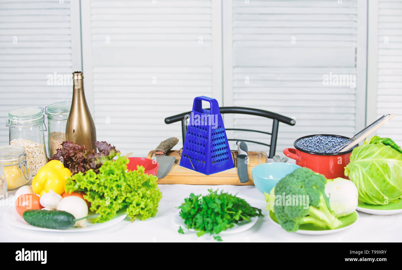 Table with culinary utensils and vegetables ingredients. Fresh ...