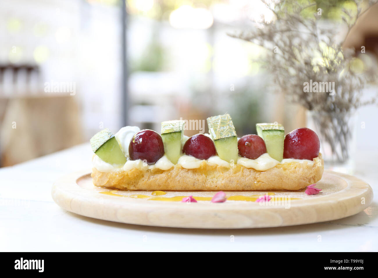Choux cream with fruit Stock Photo - Alamy