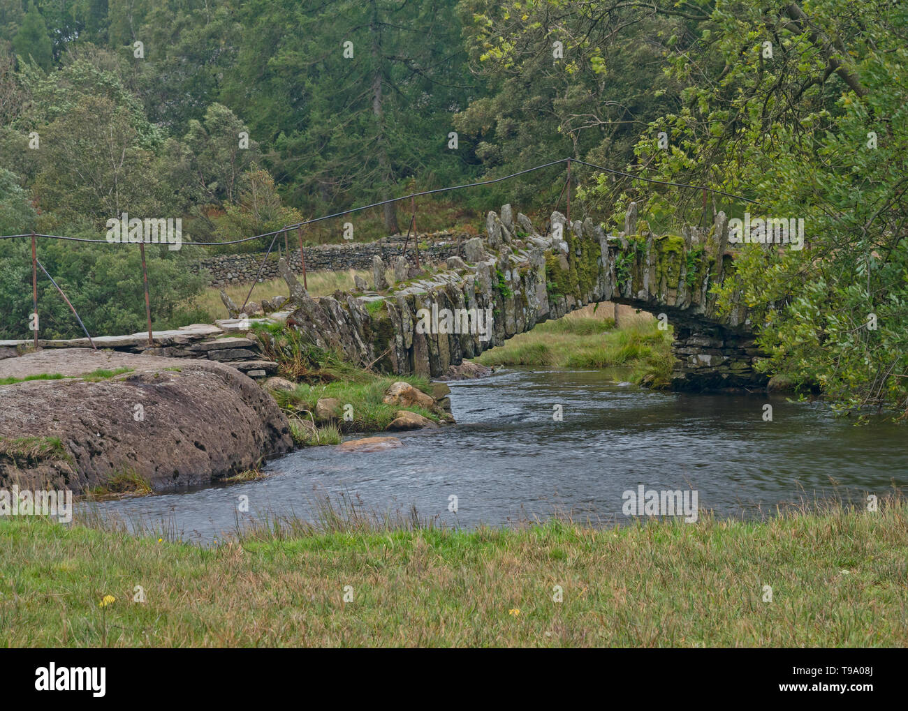Idyllic Slater Bridge near Little Langdale in the English Lake District ...
