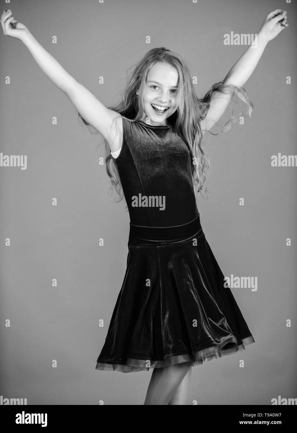 Kid dancer satisfied with concert outfit. Ballroom fashion. Girl child ...