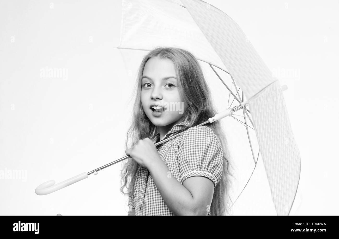 Surprised little girl with umbrella. Autumn fashion. Child. Feeling ...
