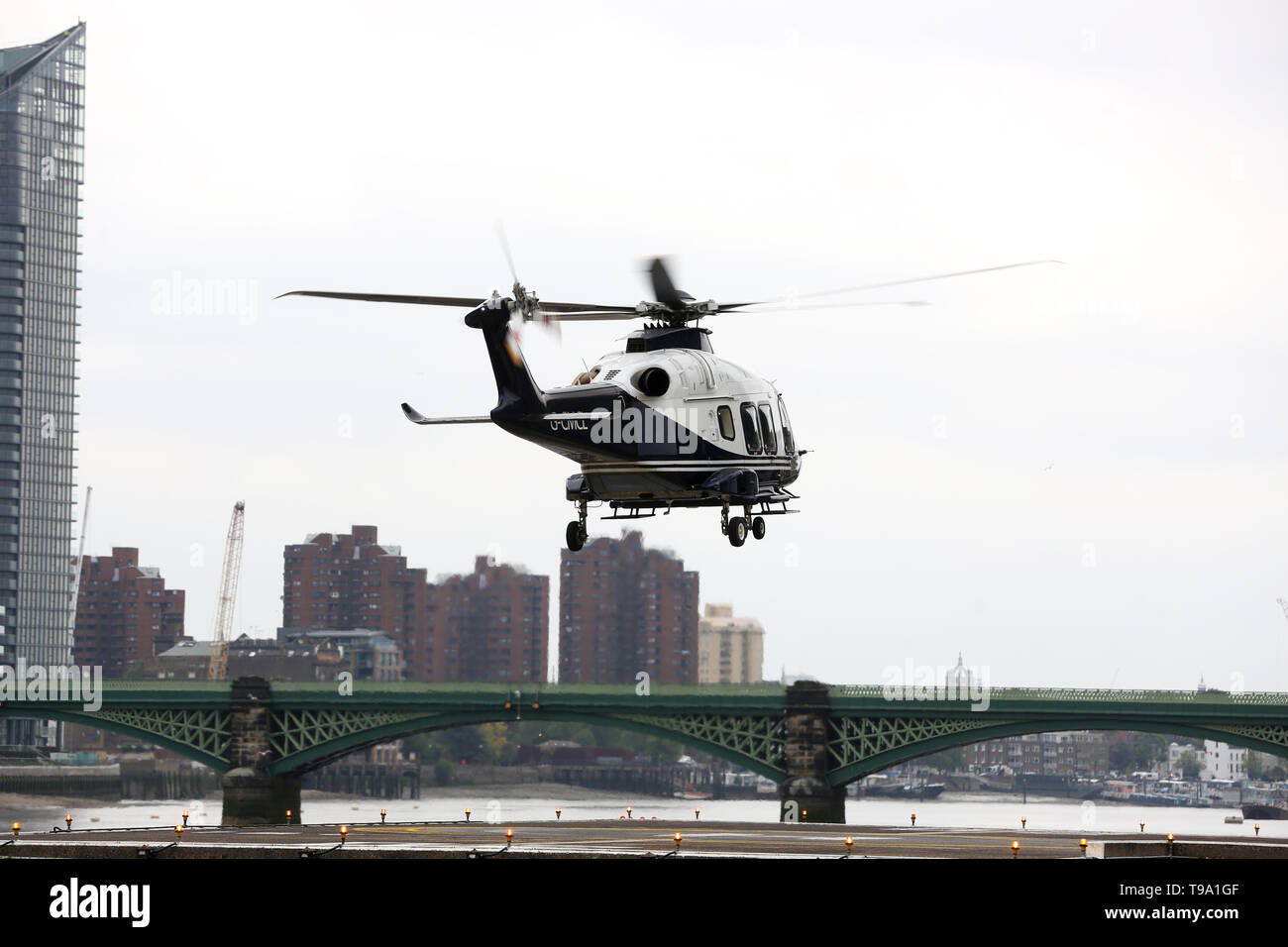 General views of a helicopter arriving and taking off at London ...