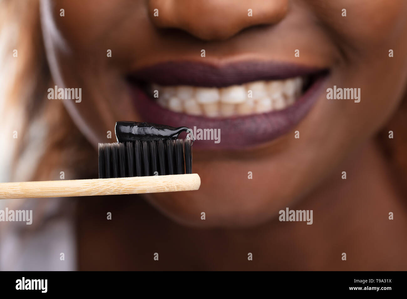 Toothbrush black charcoal toothpaste hi-res stock photography and ...