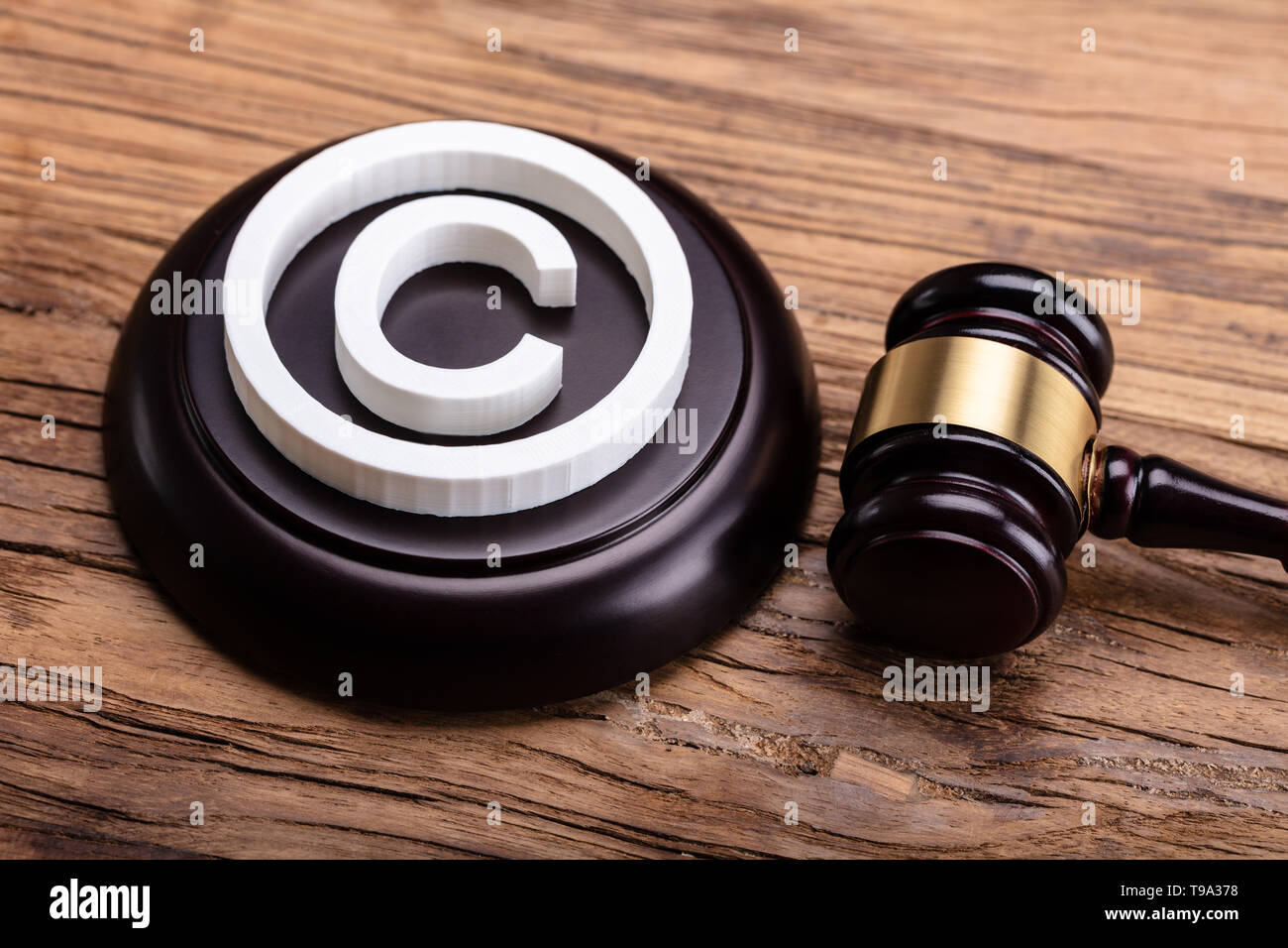 White Copyright Sign And Sound Block Over Wooden Desk Stock Photo - Alamy