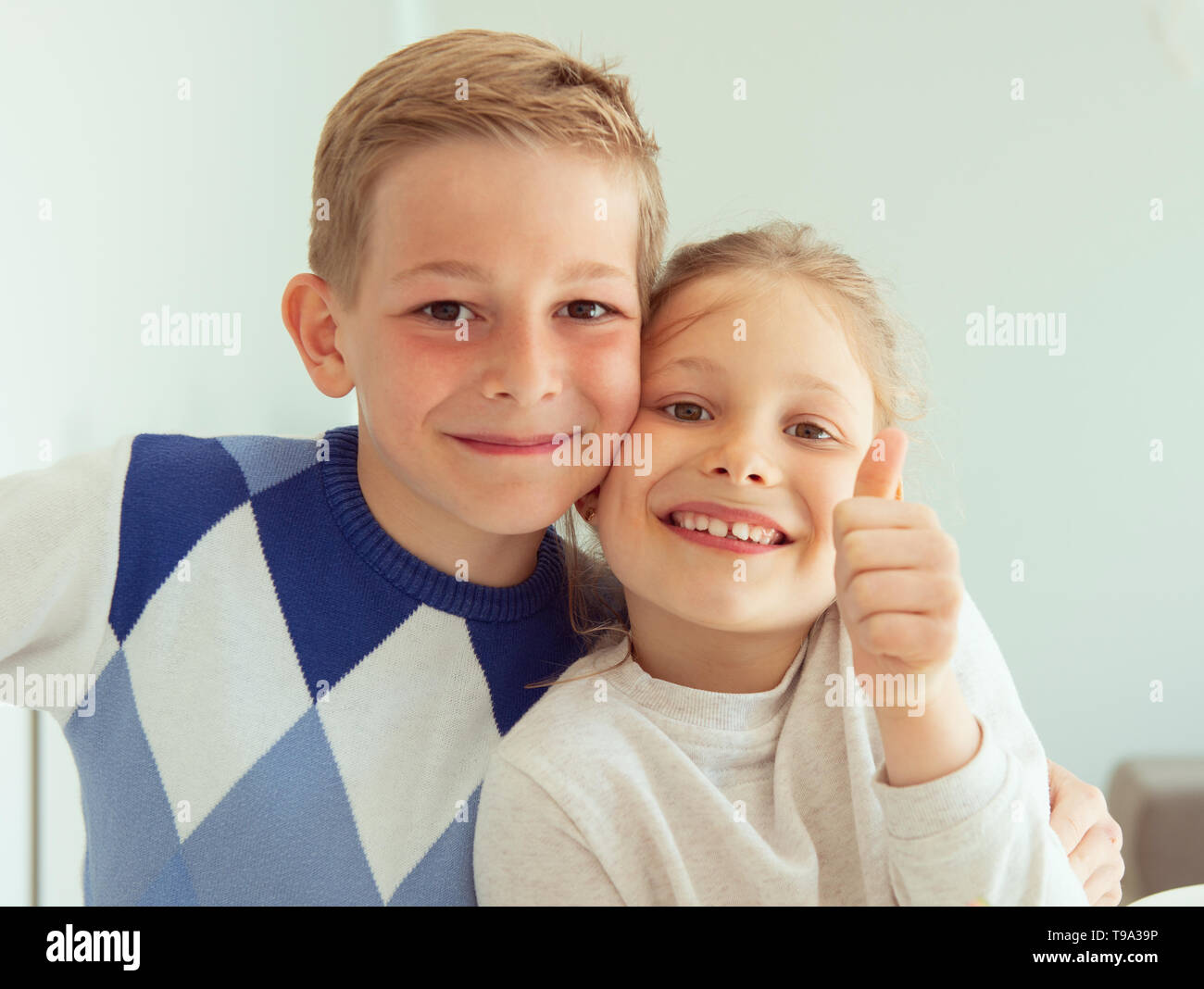 Cute little brother and sister having fun at home Stock Photo - Alamy
