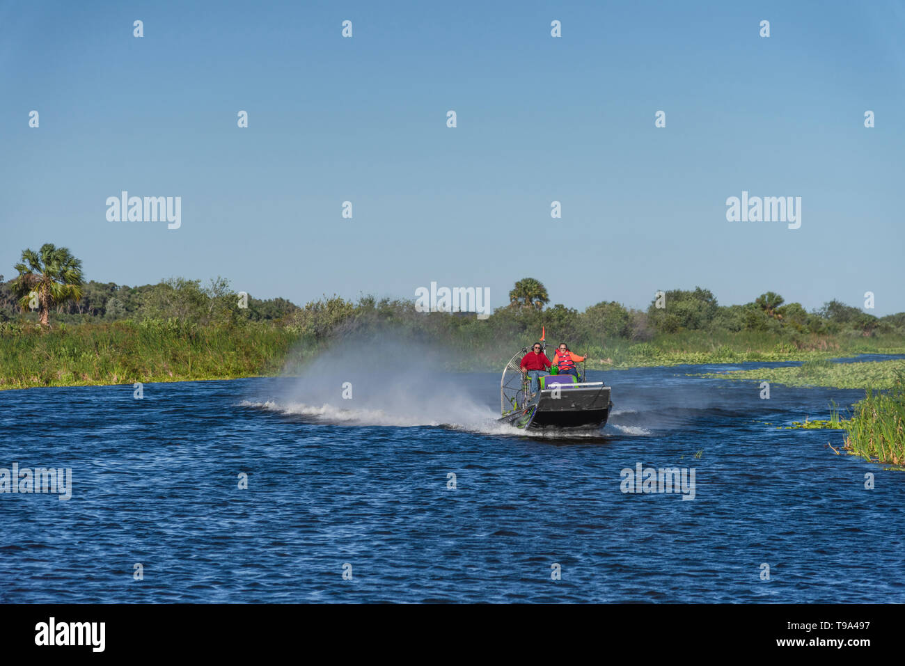 Girl driving boat hi-res stock photography and images - Alamy