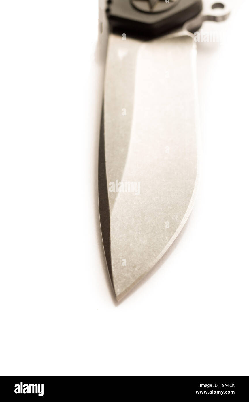 Blade of a knife on a white background. Vertical frame Stock Photo - Alamy