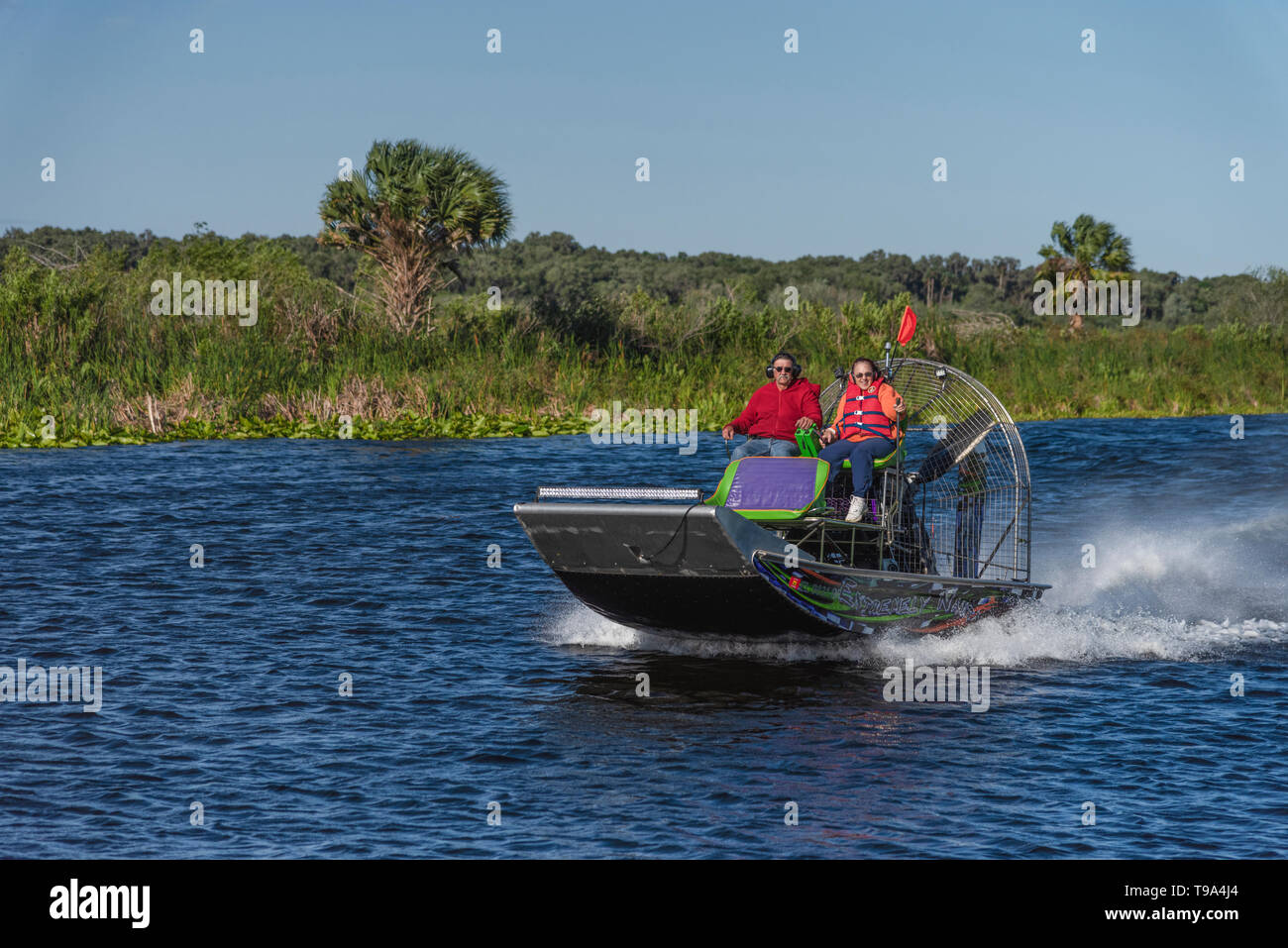 Girl driving boat hi-res stock photography and images - Alamy