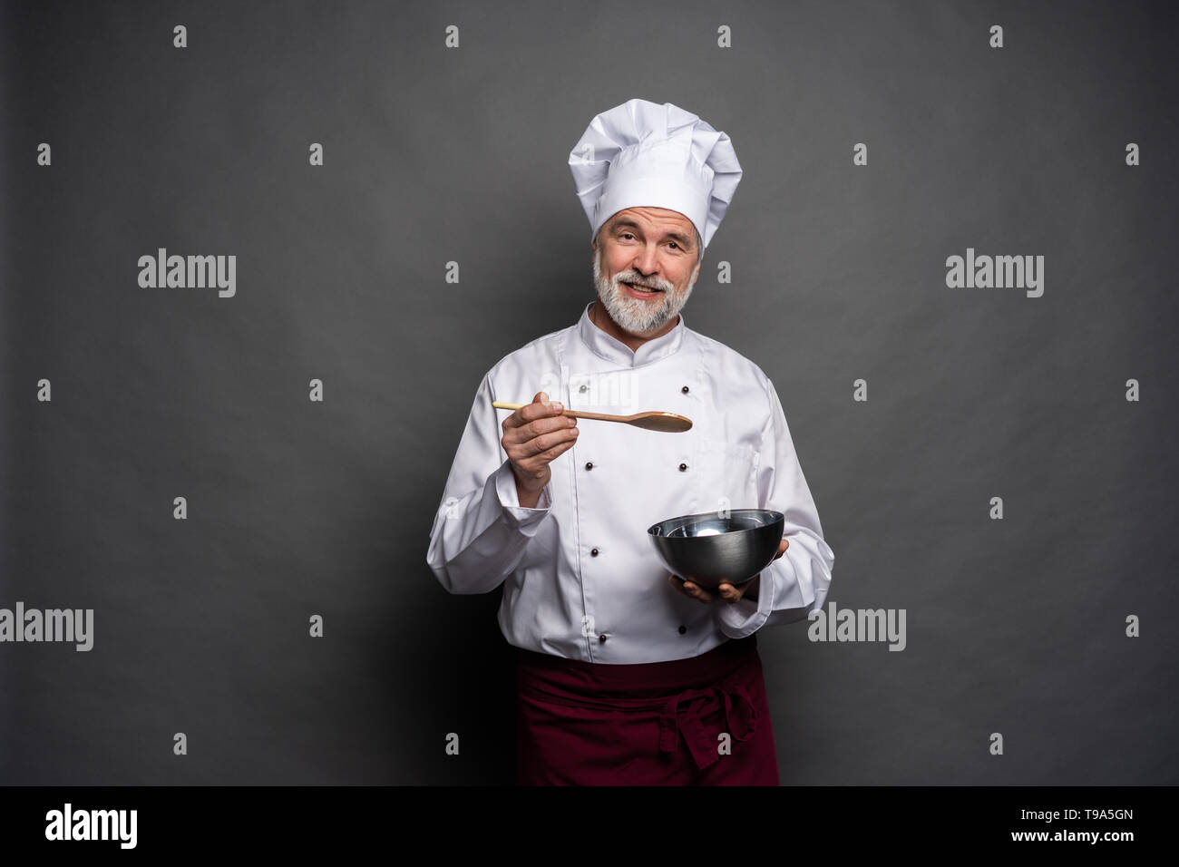 Mature black man cooking kitchen hi-res stock photography and images ...