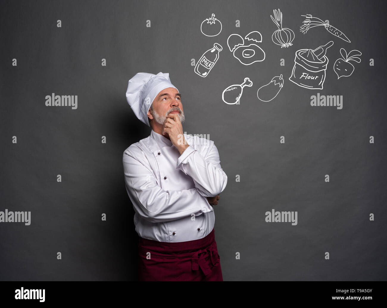 Image of chef planing what to cook on gray background.Chef thinking ...