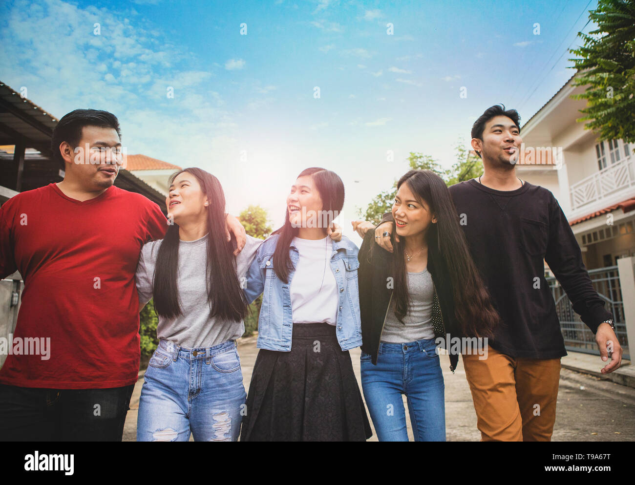 group of asian younger man and woman relaxing toothy smiling face with ...