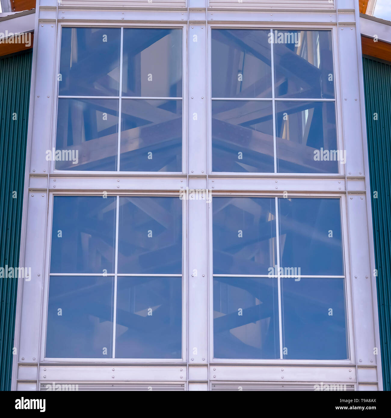 Clear Square Large glass window of a building with a bright and cloudy ...