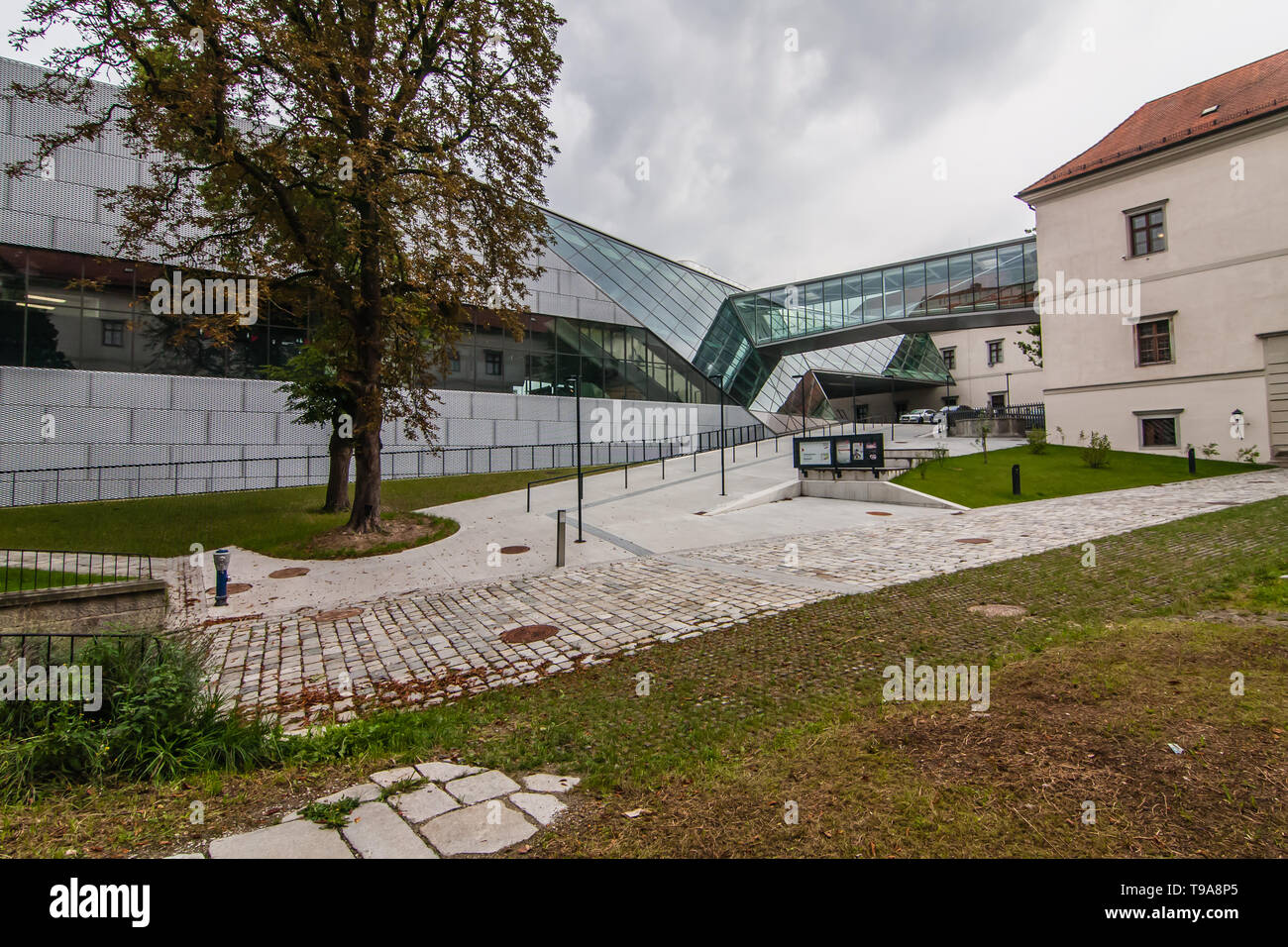 The inner courtyard of Schlossmuseum Linz, a glass-and-steel museum at ...