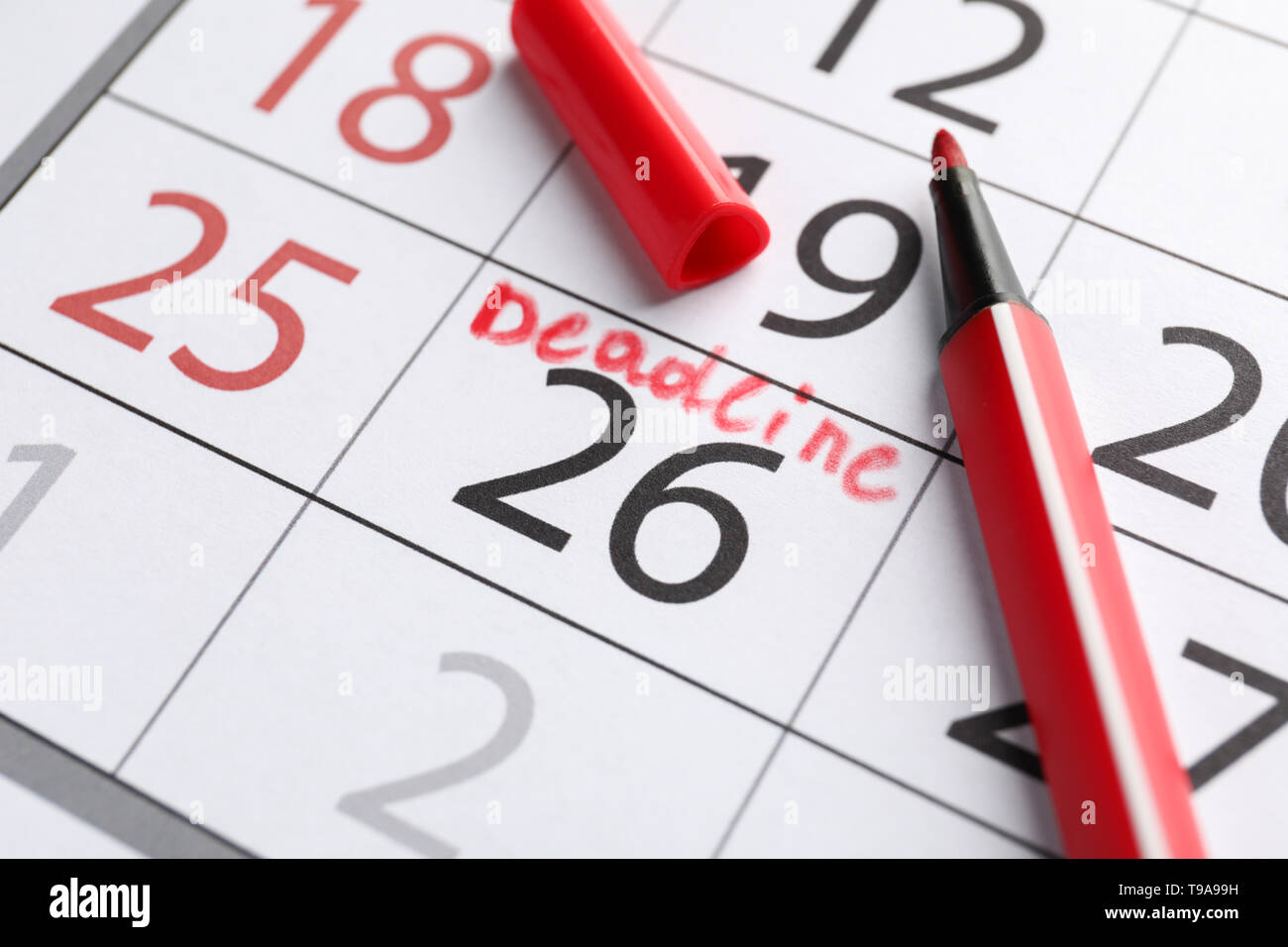 Calendar with date reminder, closeup. Deadline concept Stock Photo - Alamy