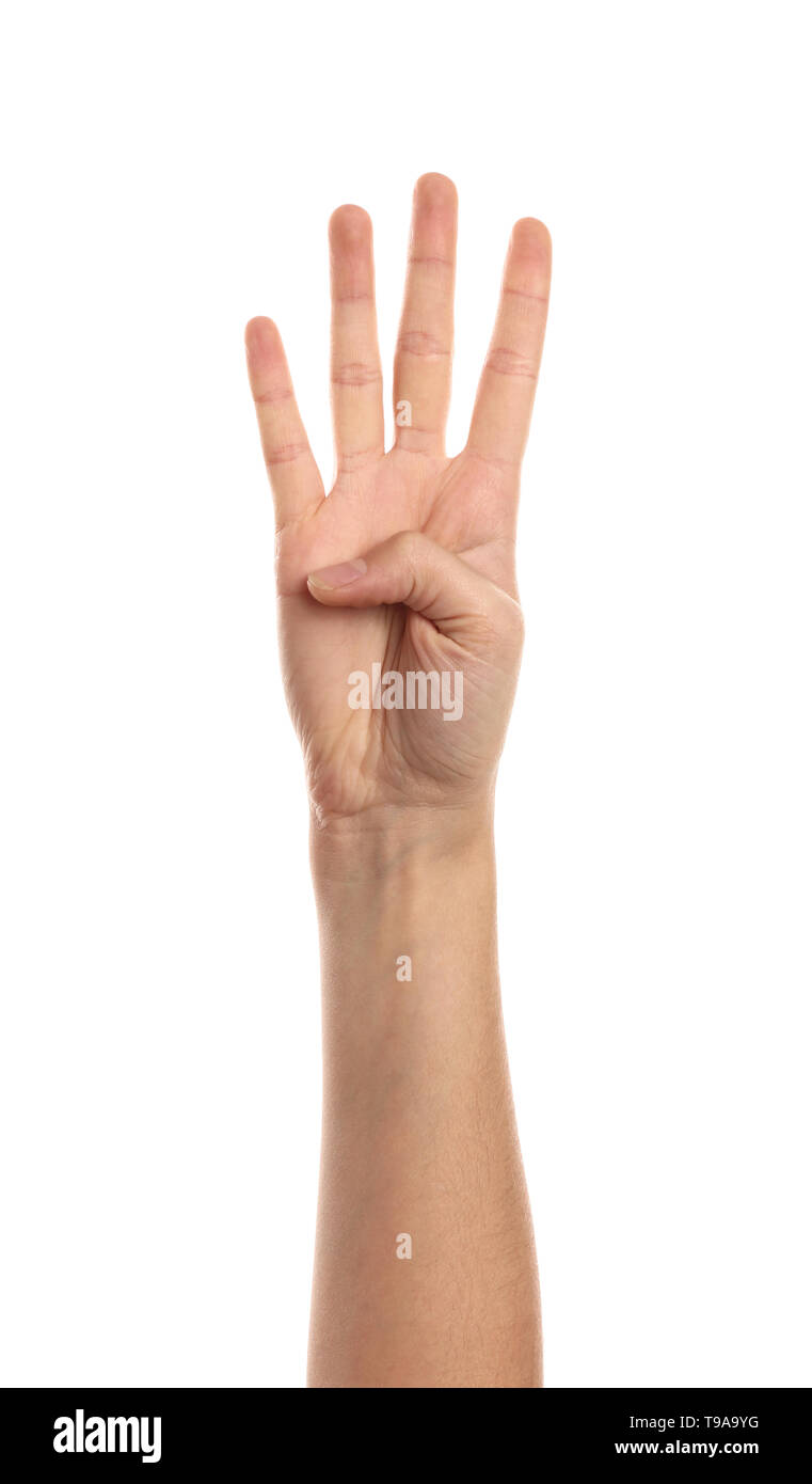 Female hand showing four fingers on white background Stock Photo - Alamy