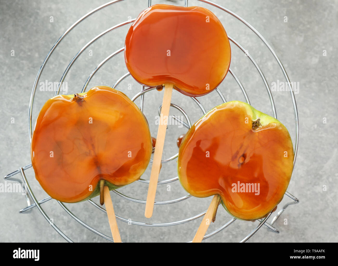 Candied apple slices hi-res stock photography and images - Alamy