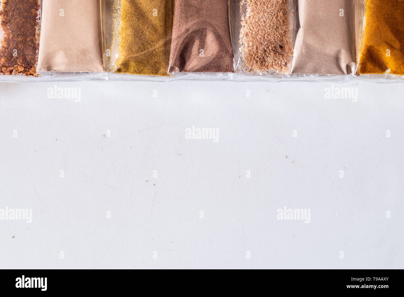 Cooking ingredients in pack white background with a space for a ...