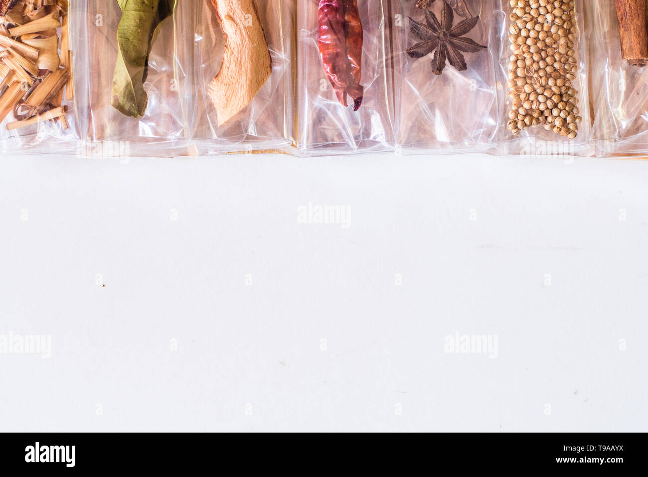 Cooking ingredients in pack white background with a space for a text ...