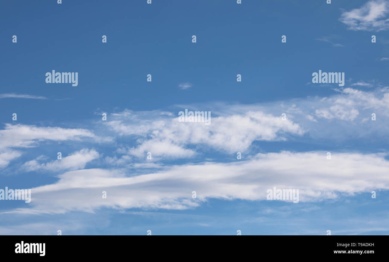 wide angle blue sky with white clouds in horizontal format Stock Photo ...