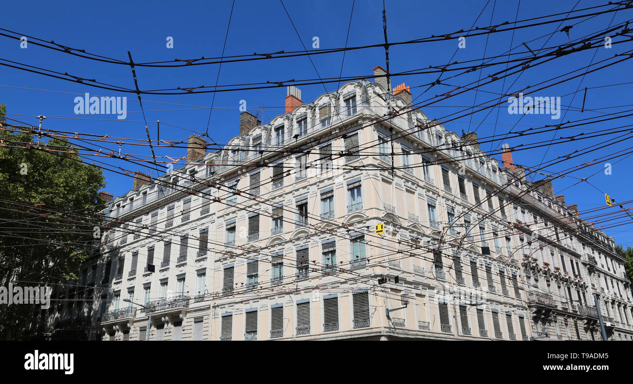 tangle of electric wires at an intersection between tram lines Stock ...