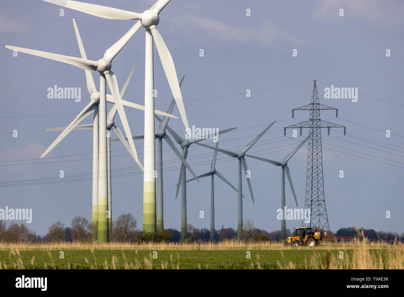 Power lines, wind farm near the city Norden, in East Frisia, Lower ...