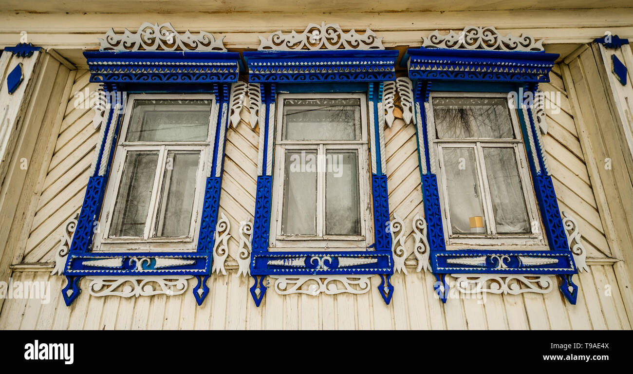 Colorful windows of a traditional Russian wooden country house in ...