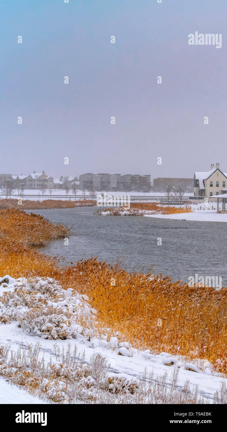 Clear Vertical Daybreak homes around Oquirrh Lake seen in winter Stock ...