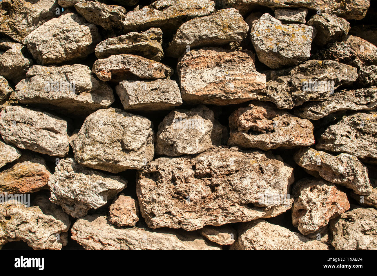 Old rural dry masonry stone wall closeup as stone background Stock ...